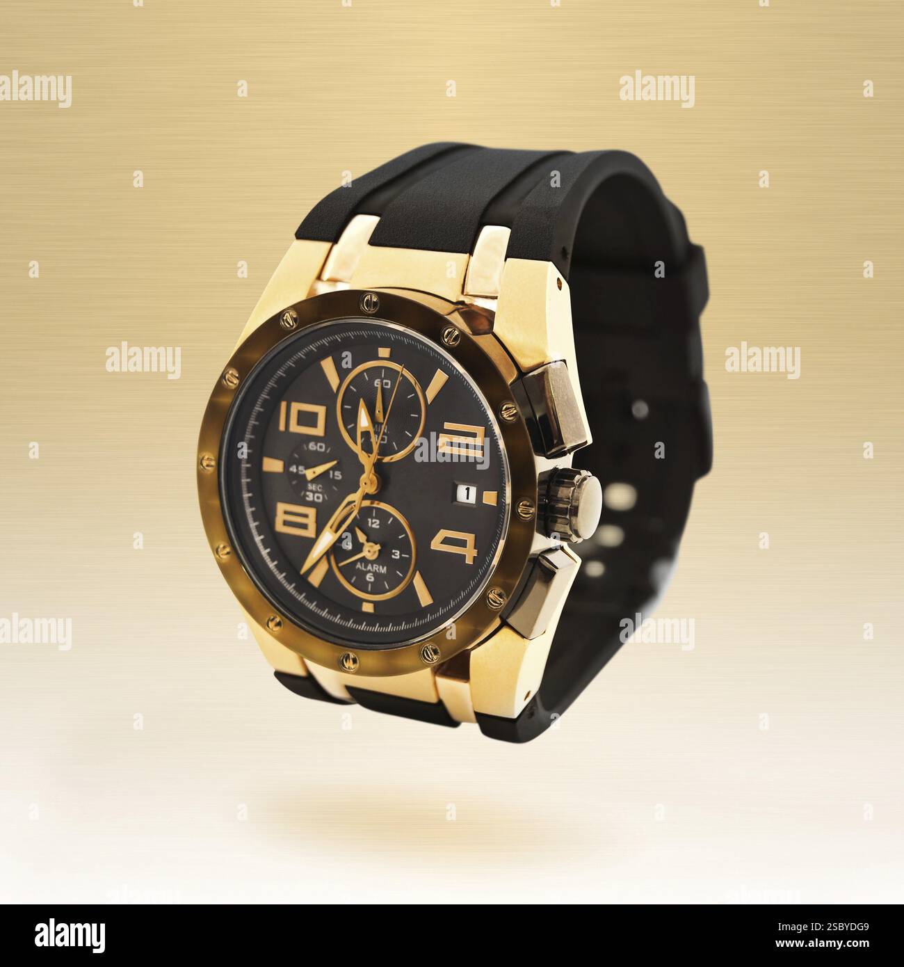 Luxury Golden Men's Watch Against Golden Background Stock Photo - Alamy