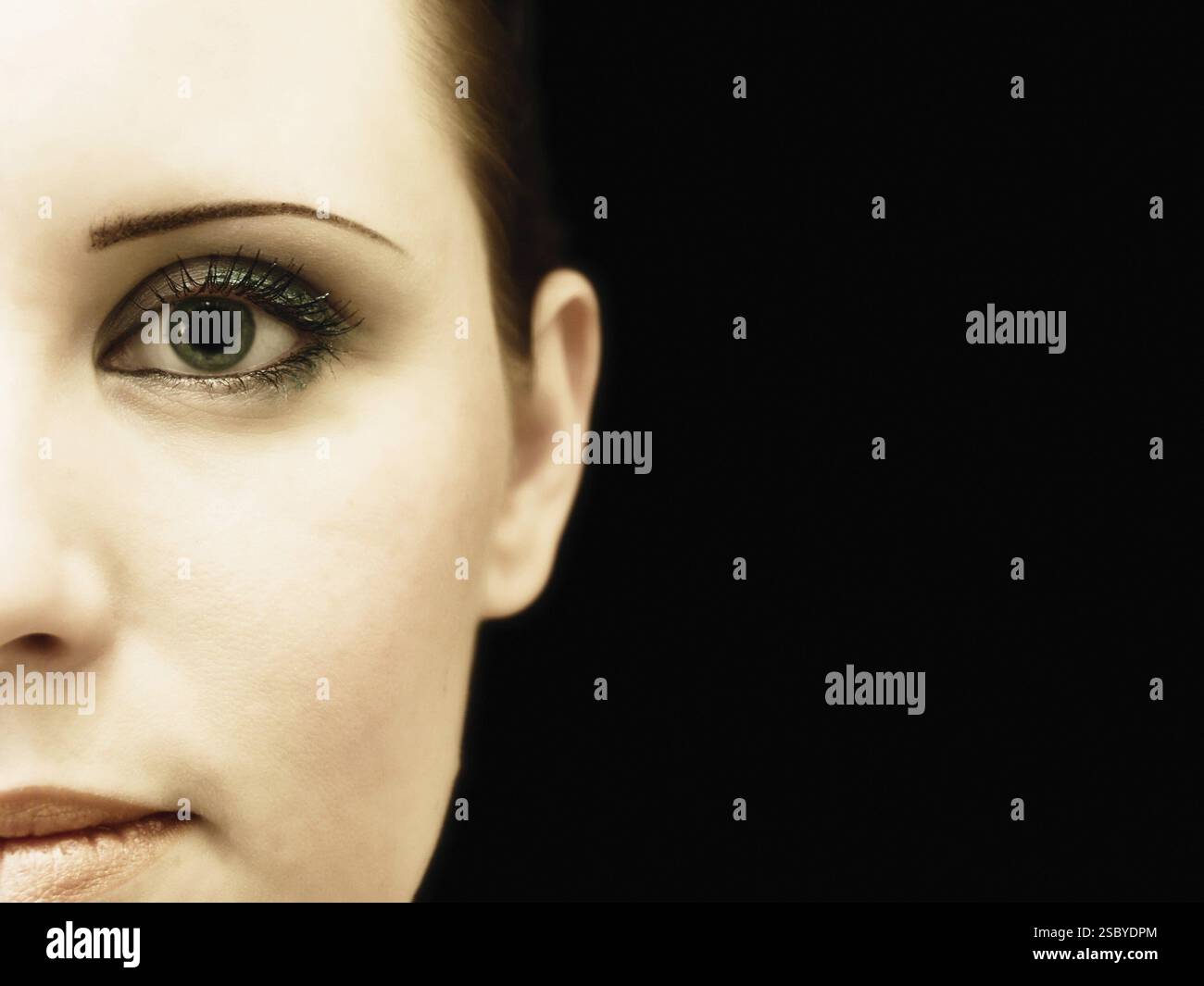 Half woman face against the black background Stock Photo - Alamy