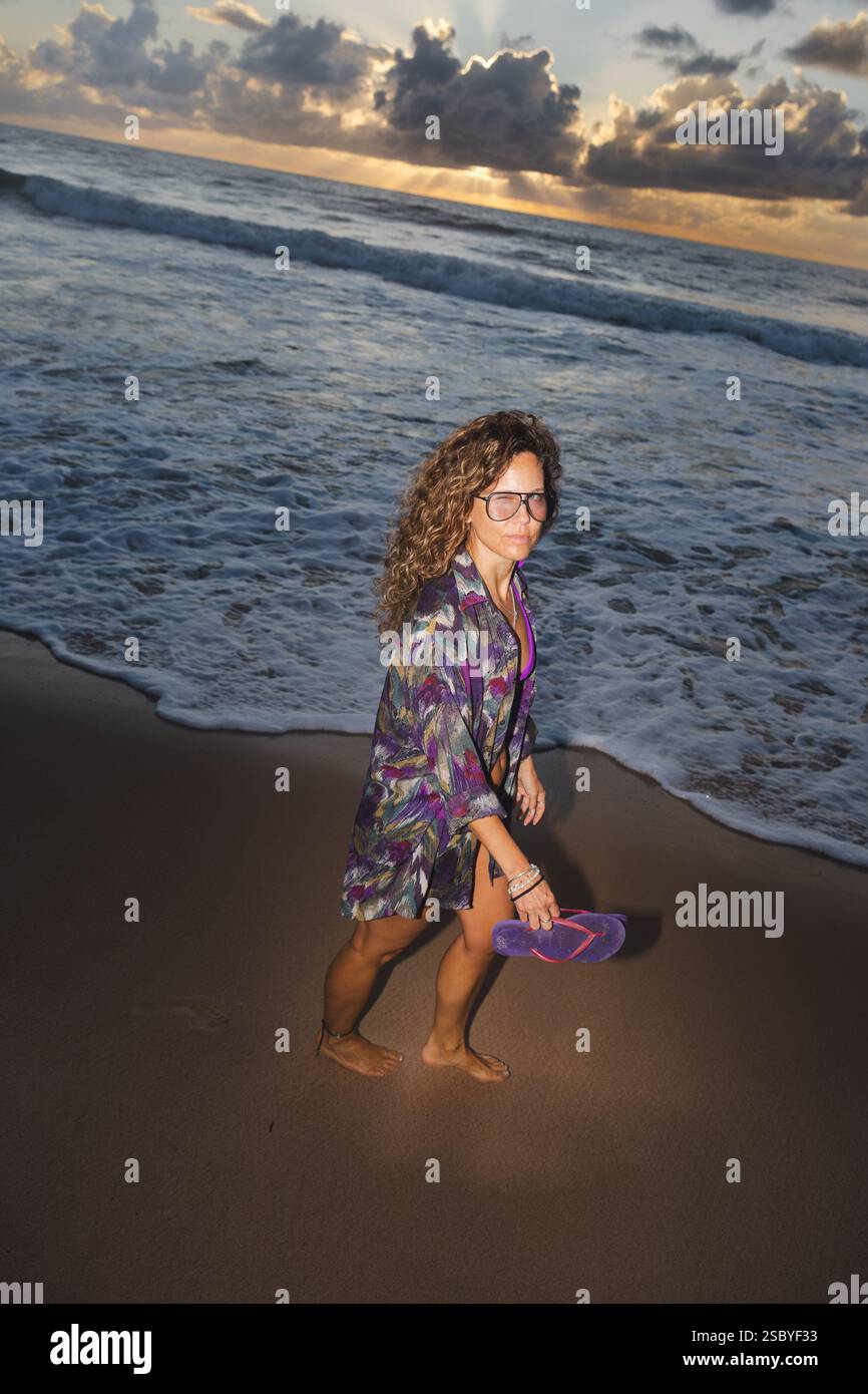 Middle age woman blinking eye in the beach photos with direct flash ...