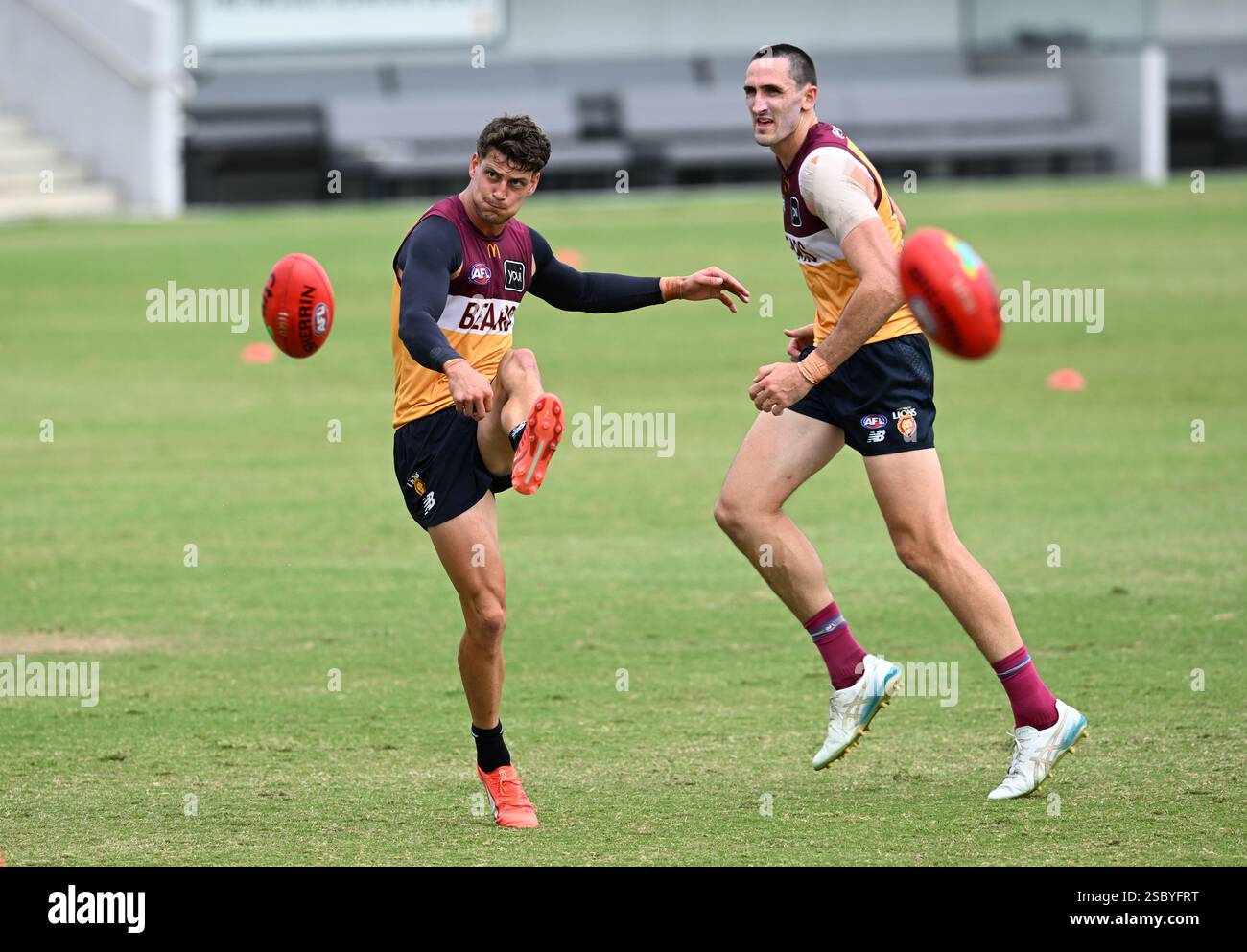 Jarrod Berry (left) and Oscar McInerney (right) of the Lions are seen ...