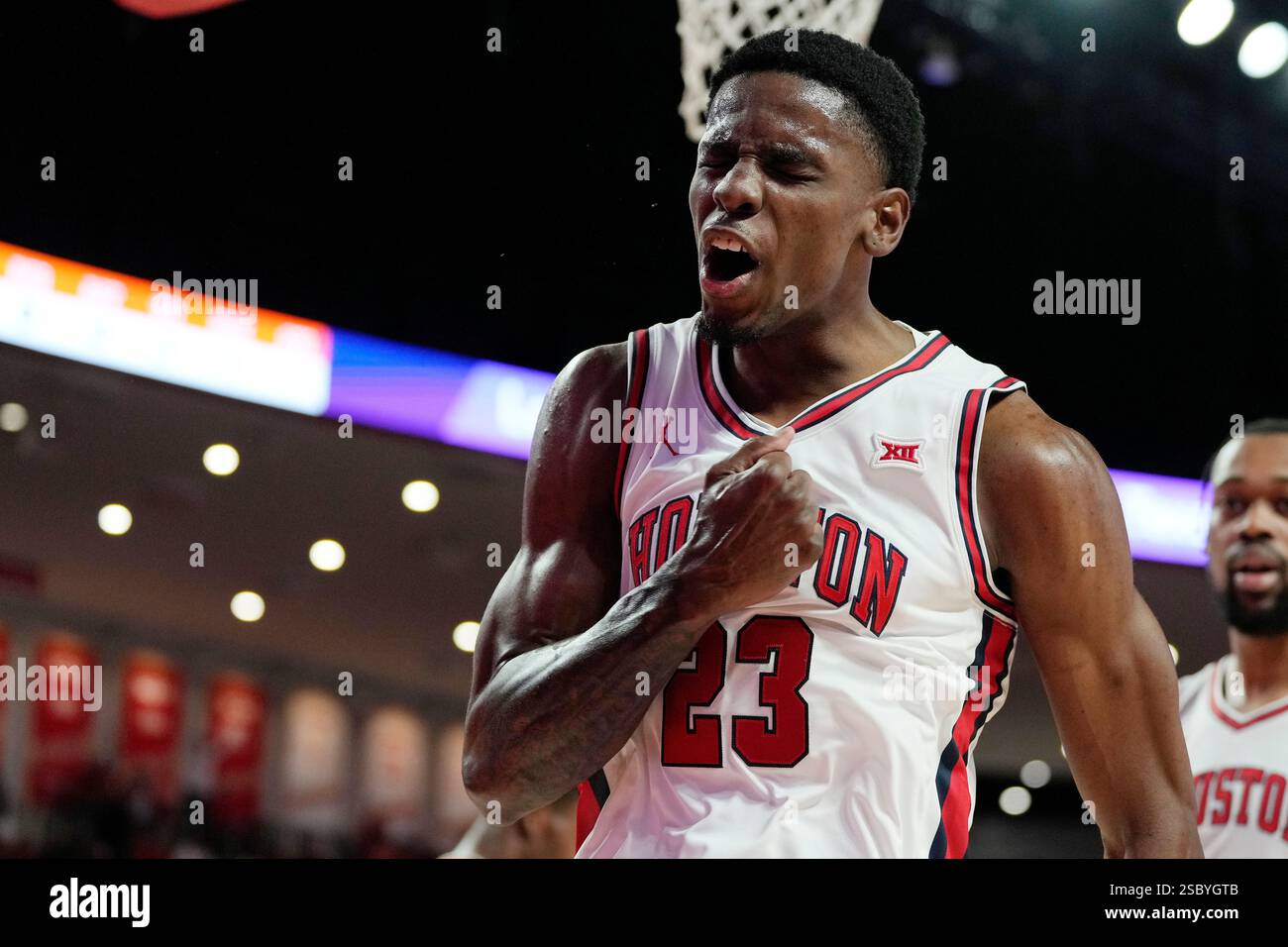 Houston guard Terrance Arceneaux (23) celebrates after scoring and ...