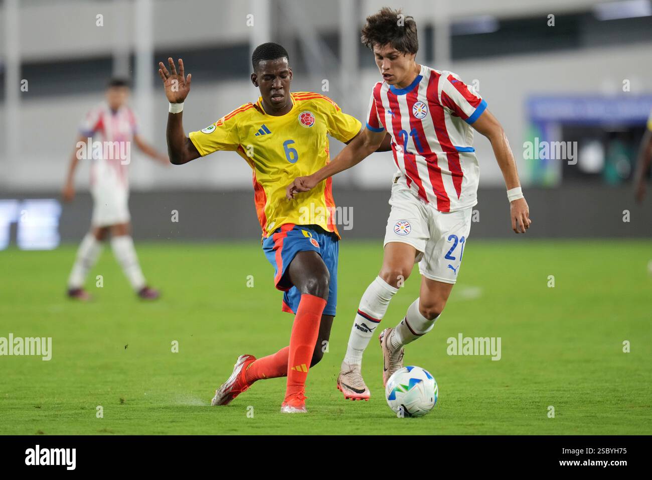 Colombia's Alejandro Ararat, left, and Paraguay's Octavio Alfonso ...