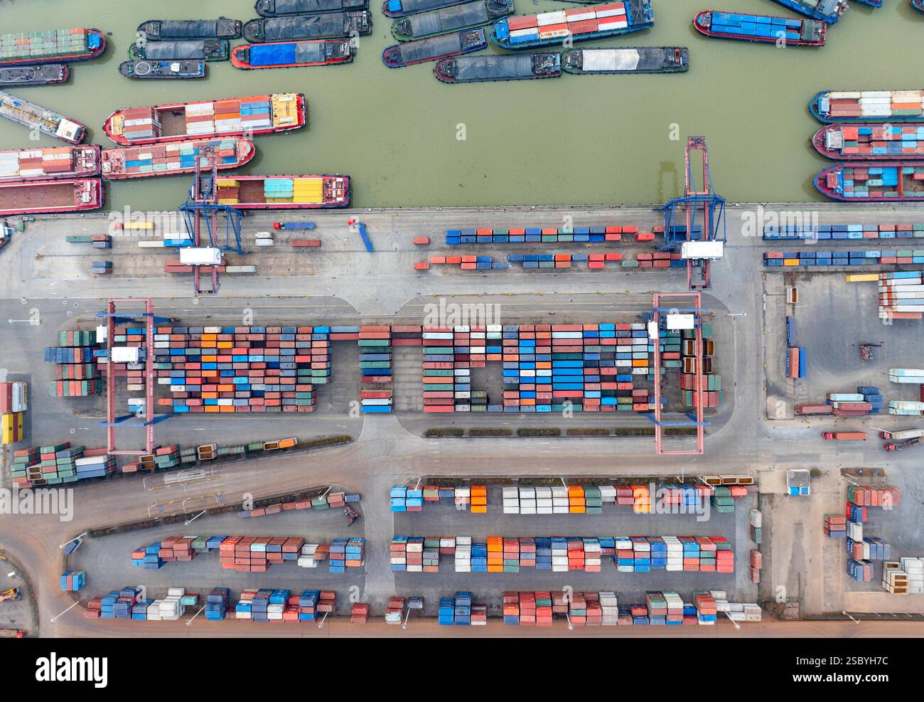 HUAI'AN, CHINA - FEBRUARY 5, 2025 - Cargo ships are docked for loading ...