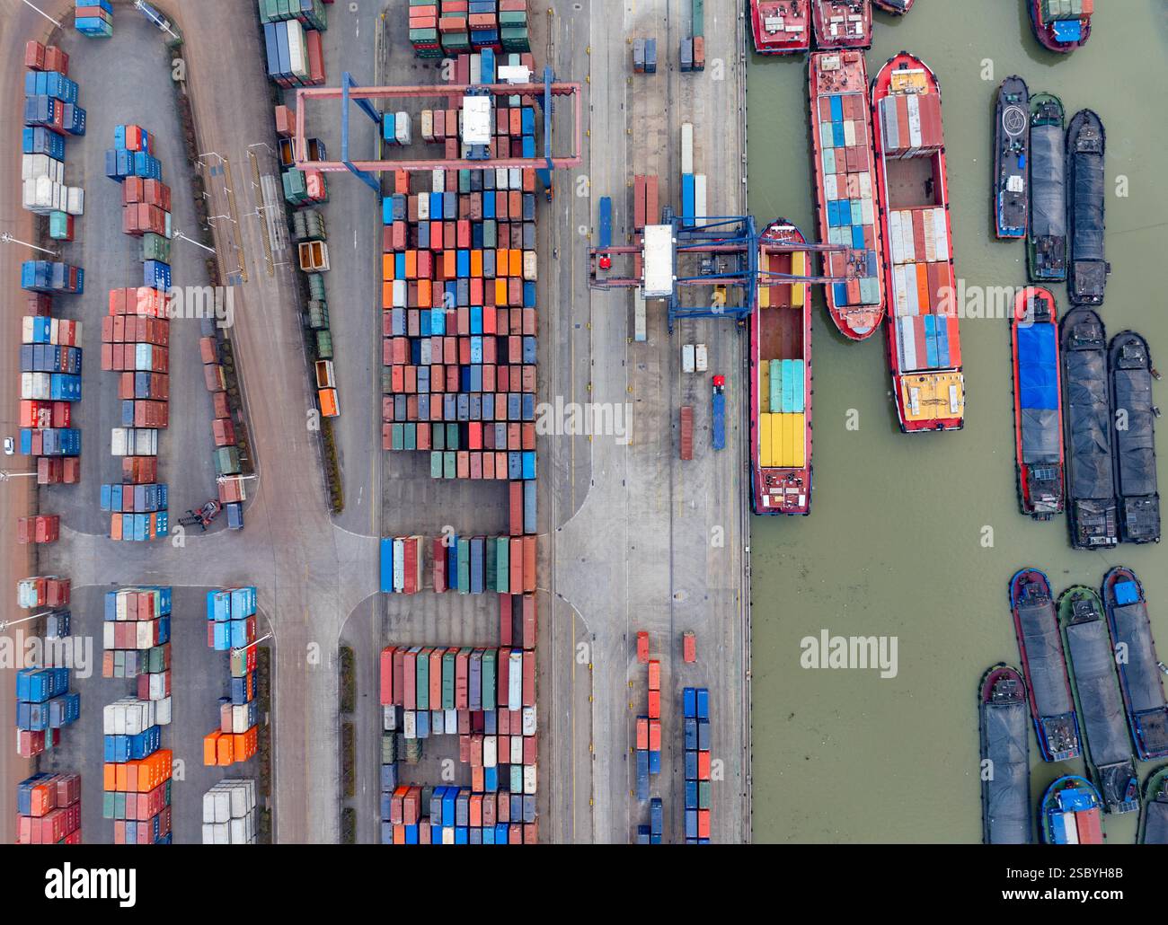 HUAI'AN, CHINA - FEBRUARY 5, 2025 - Cargo ships are docked for loading ...