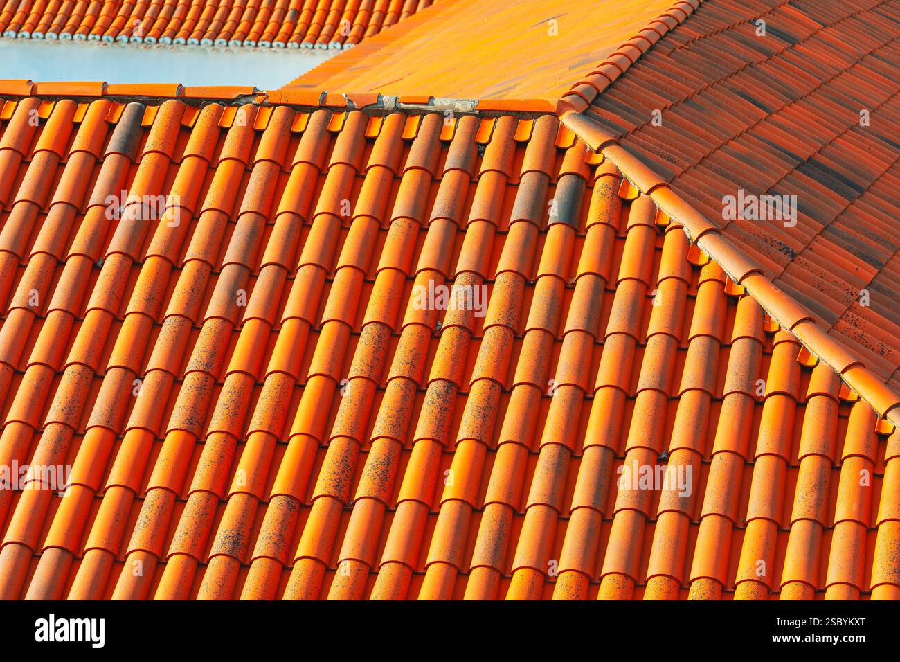 Textured surface of a traditional terracotta tile roof. Rooftop covered ...