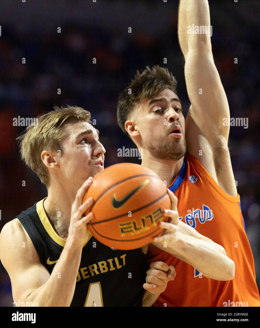 Vanderbilt guard Grant Huffman, left, shoots under pressure from ...