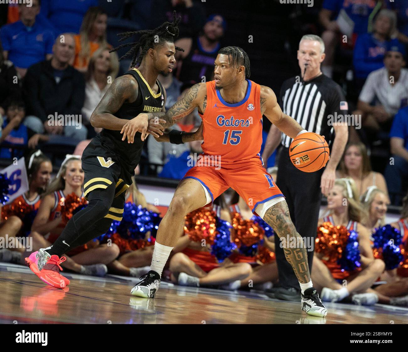 Vanderbilt guard Jason Edwards, left, pressures Florida guard Alijah ...