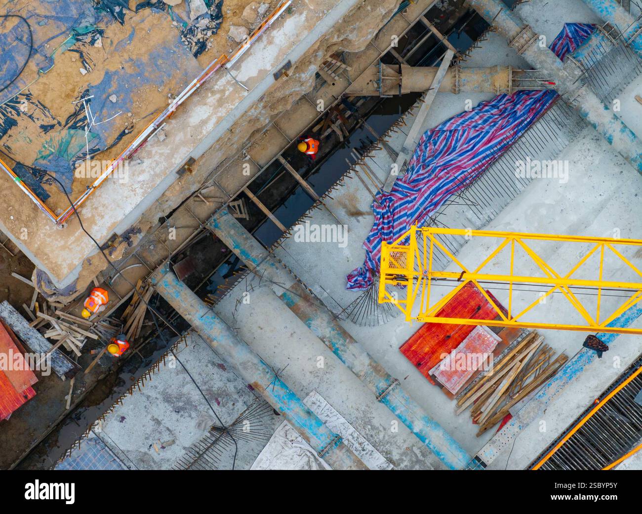 HUAI'AN, CHINA - FEBRUARY 5, 2025 - Workers work on the bottom of the ...