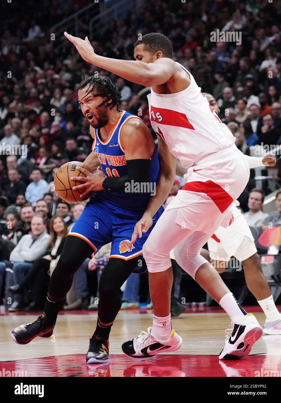 Toronto, Canada. 04th Feb, 2025. New York Knicks' Jalen Brunson (left ...