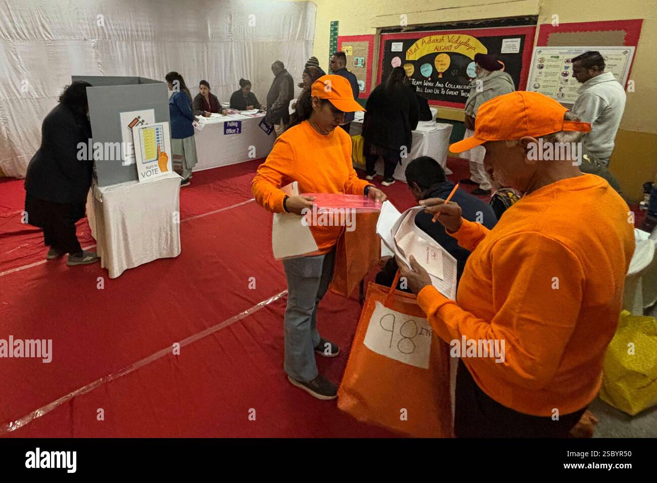 People cast their votes for the capital’s state legislature election at ...