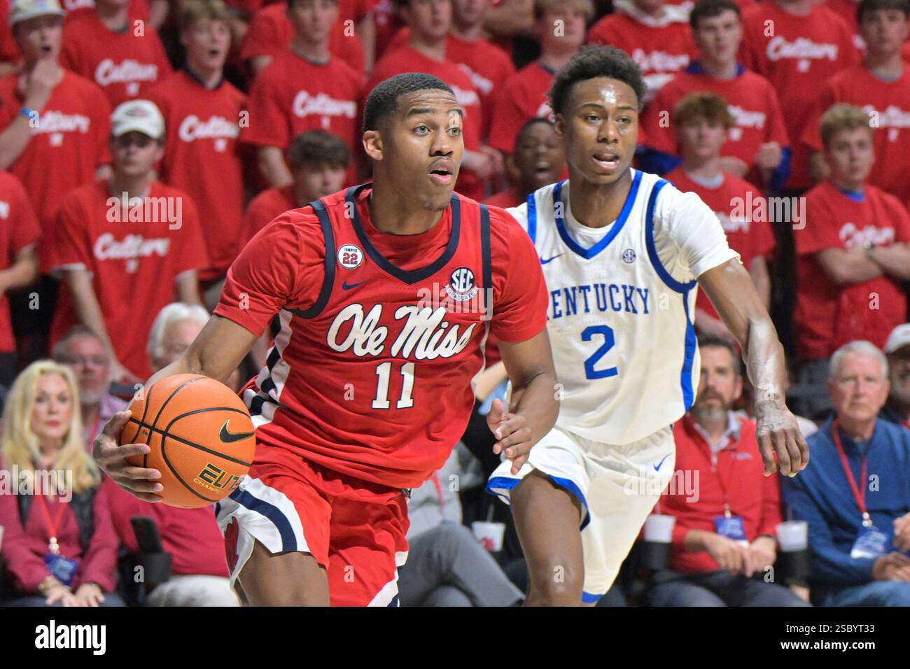 Mississippi guard Matthew Murrell (11) drives past Kentucky guard ...