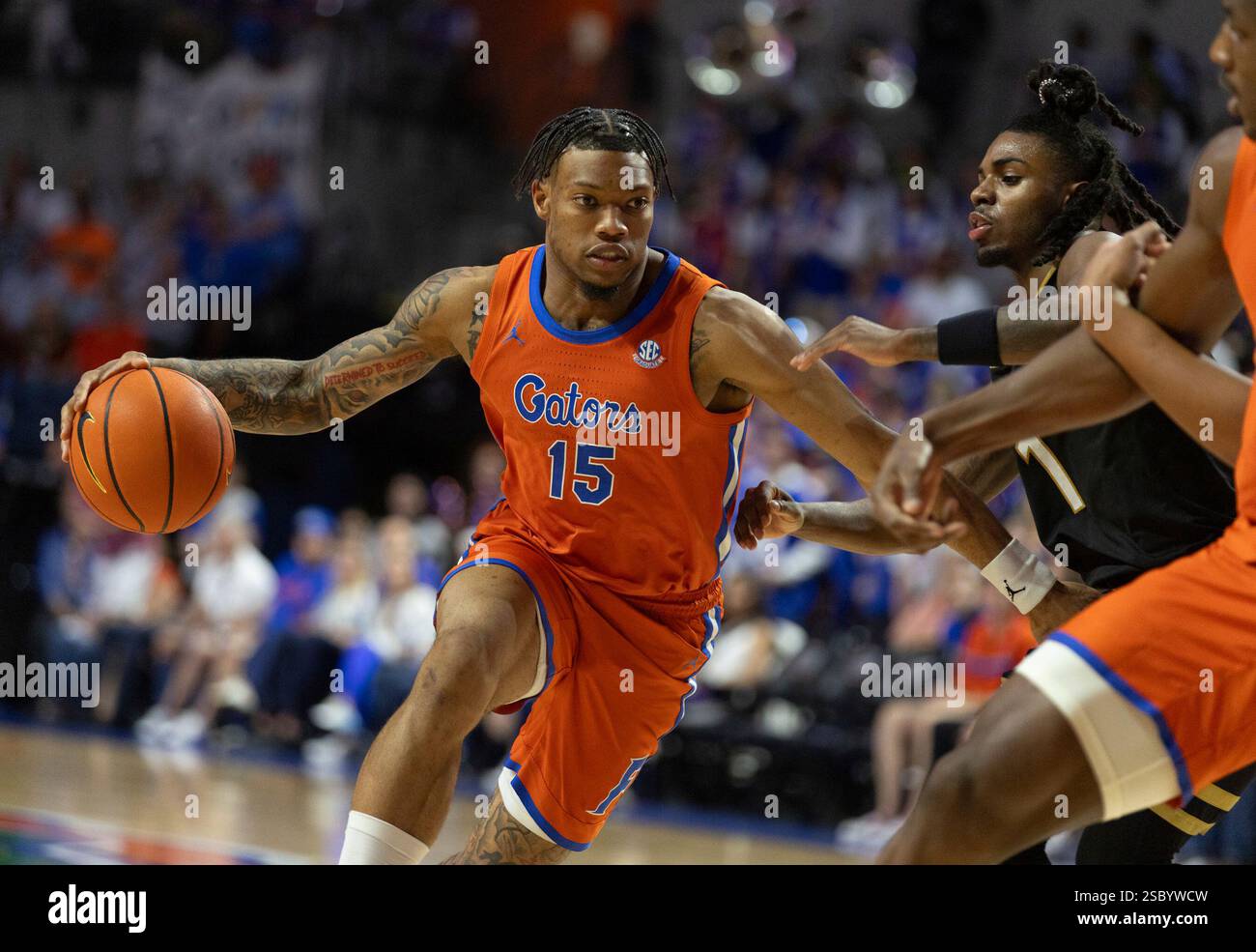 Florida guard Alijah Martin (15) drives against Vanderbilt guard Jason ...