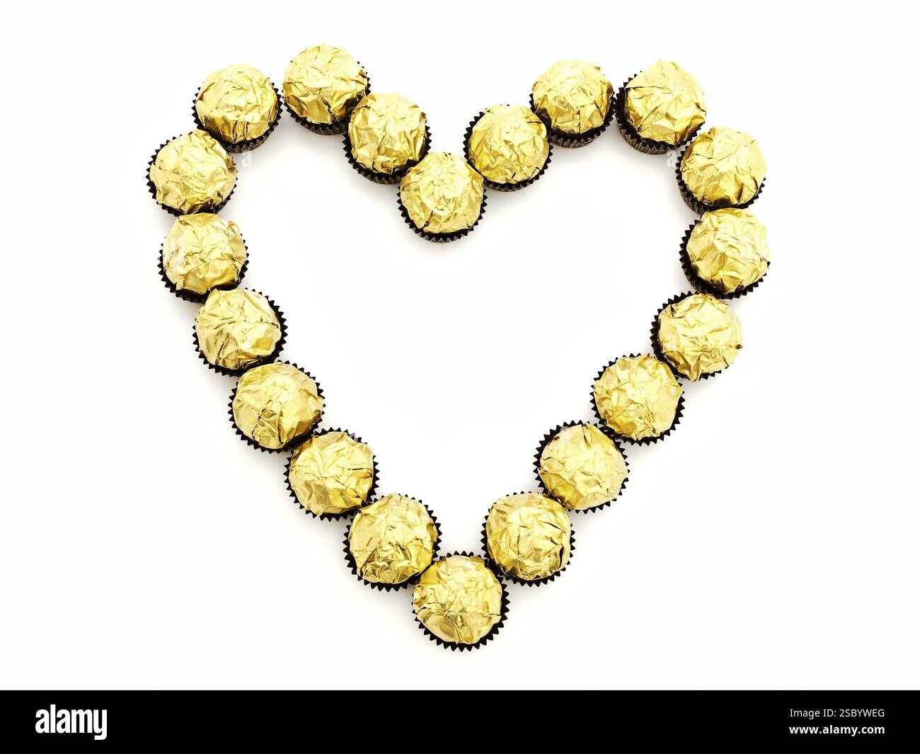 Heart Shape From Sweets In Golden Candy Wrapper Stock Photo - Alamy
