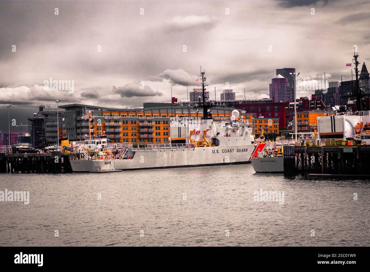 Coast Guard ships anchored at the harbor with urban skyline view Stock ...