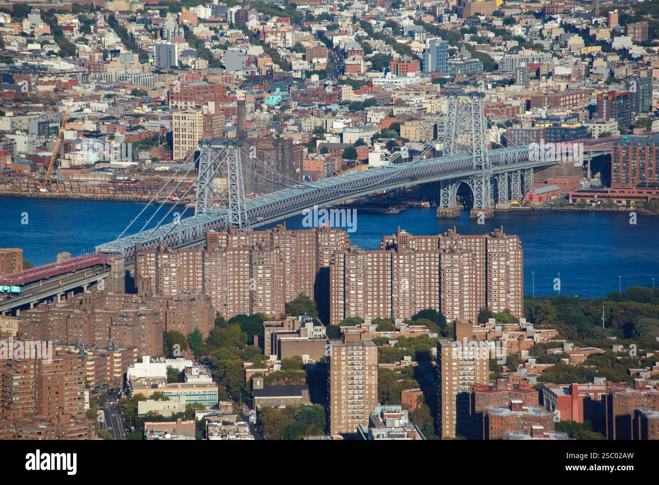 The Williamsburg over the Hudson river and Brooklyn, New York City ...