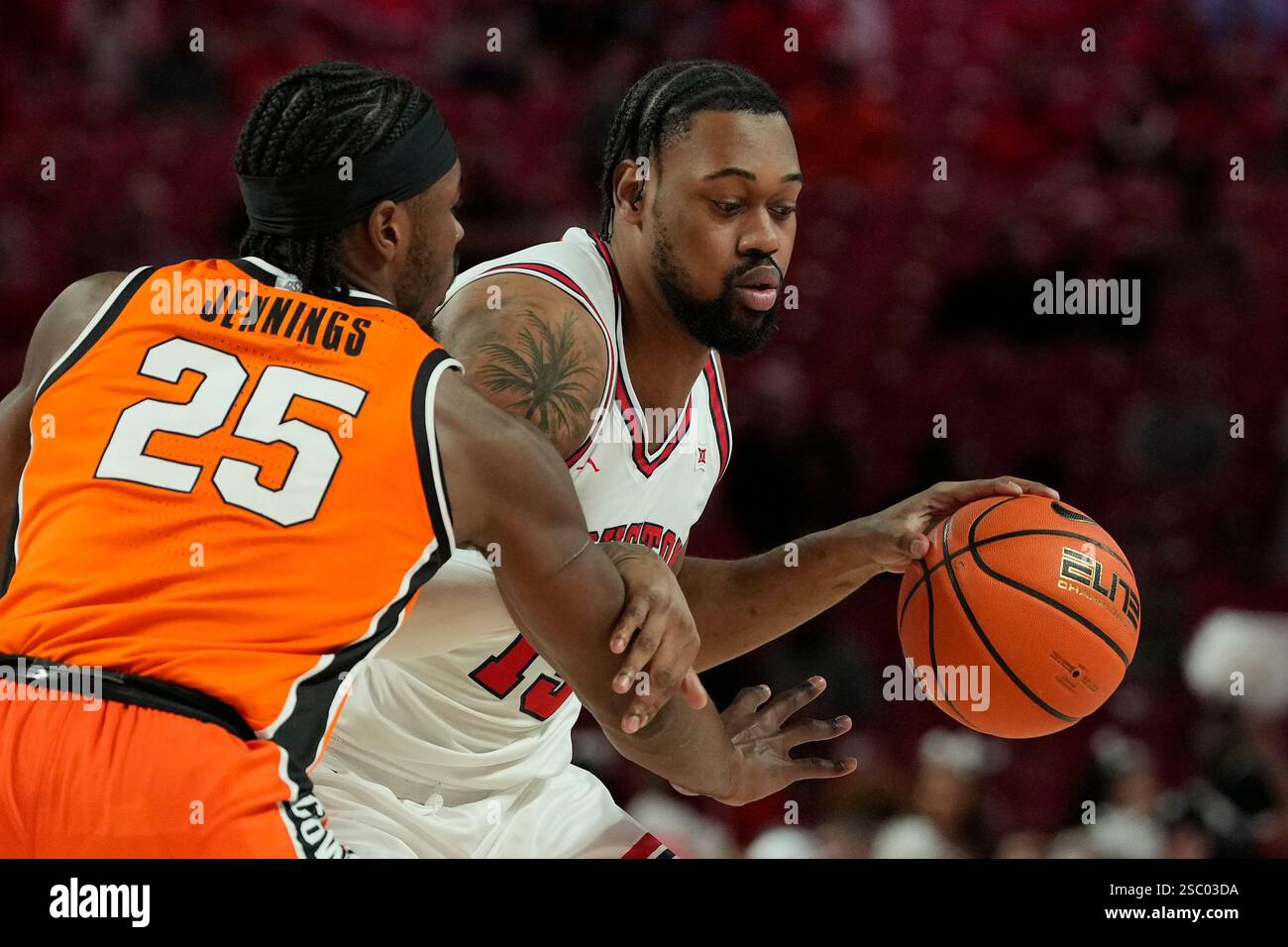 Houston forward J'Wan Roberts (13) is defended by Oklahoma State ...