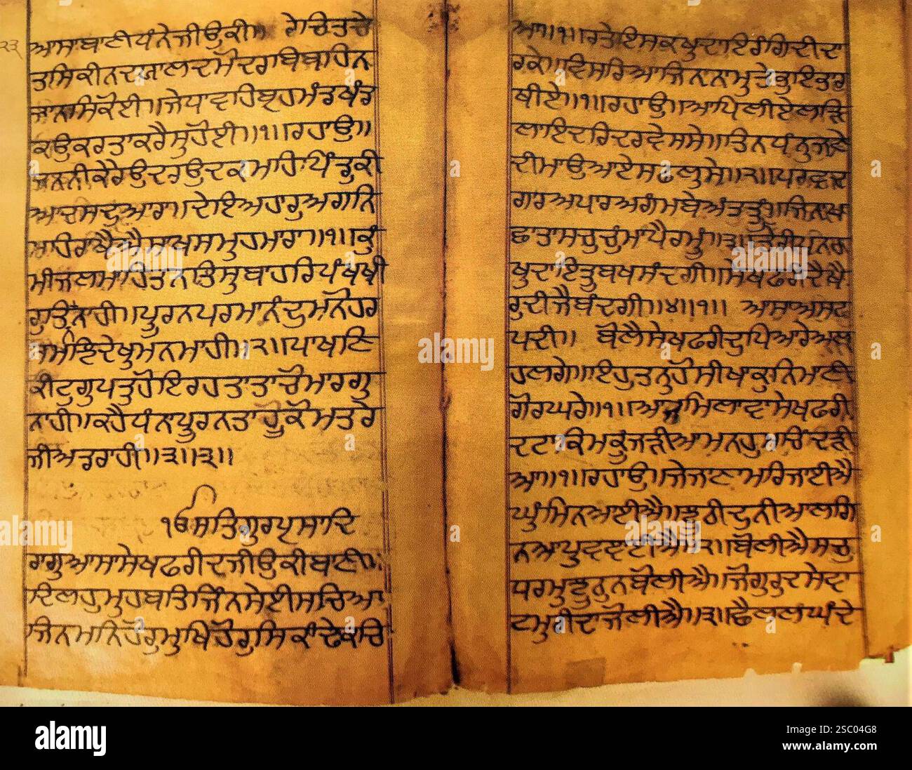 Historical Guru Granth Sahib manuscript showcasing crisp calligraphy ...
