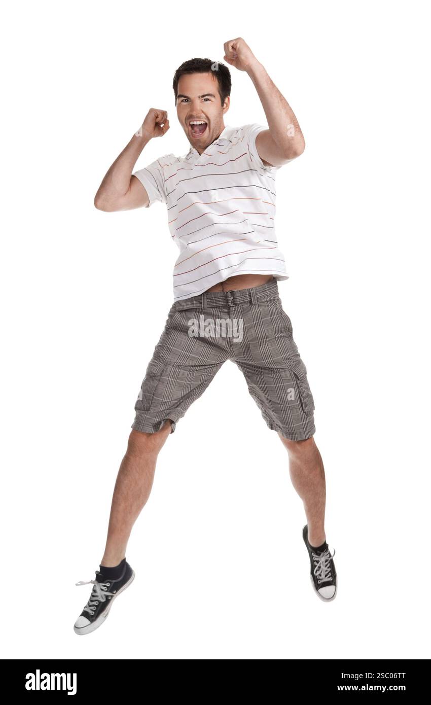 Young happy man jumping on a white background Stock Photo - Alamy