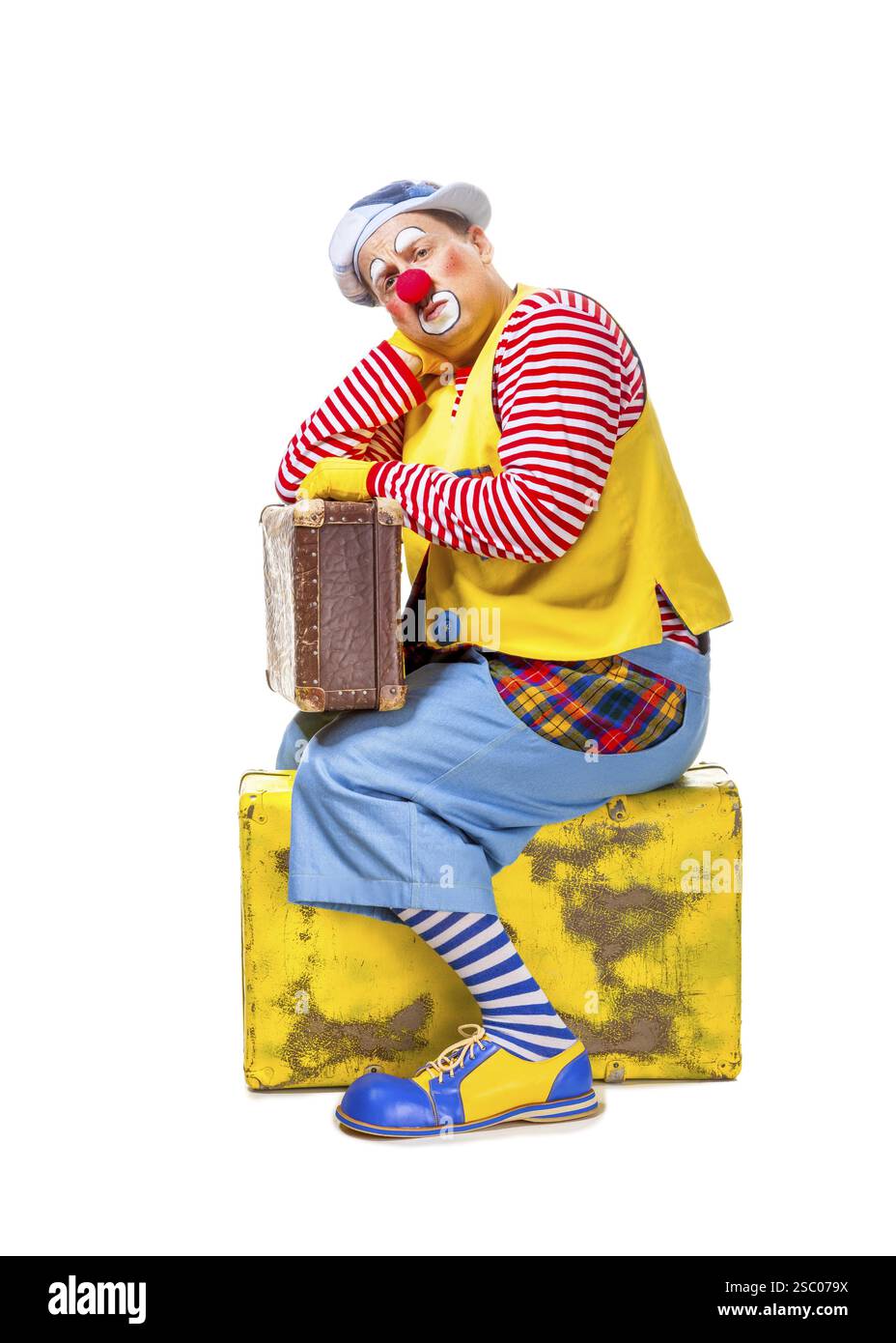 A funny clown with smiling joyful expression, isolated on white ...