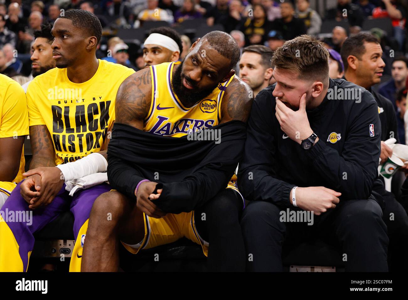 Los Angeles Lakers guard Luka Doncic, right, talks to forward LeBron ...