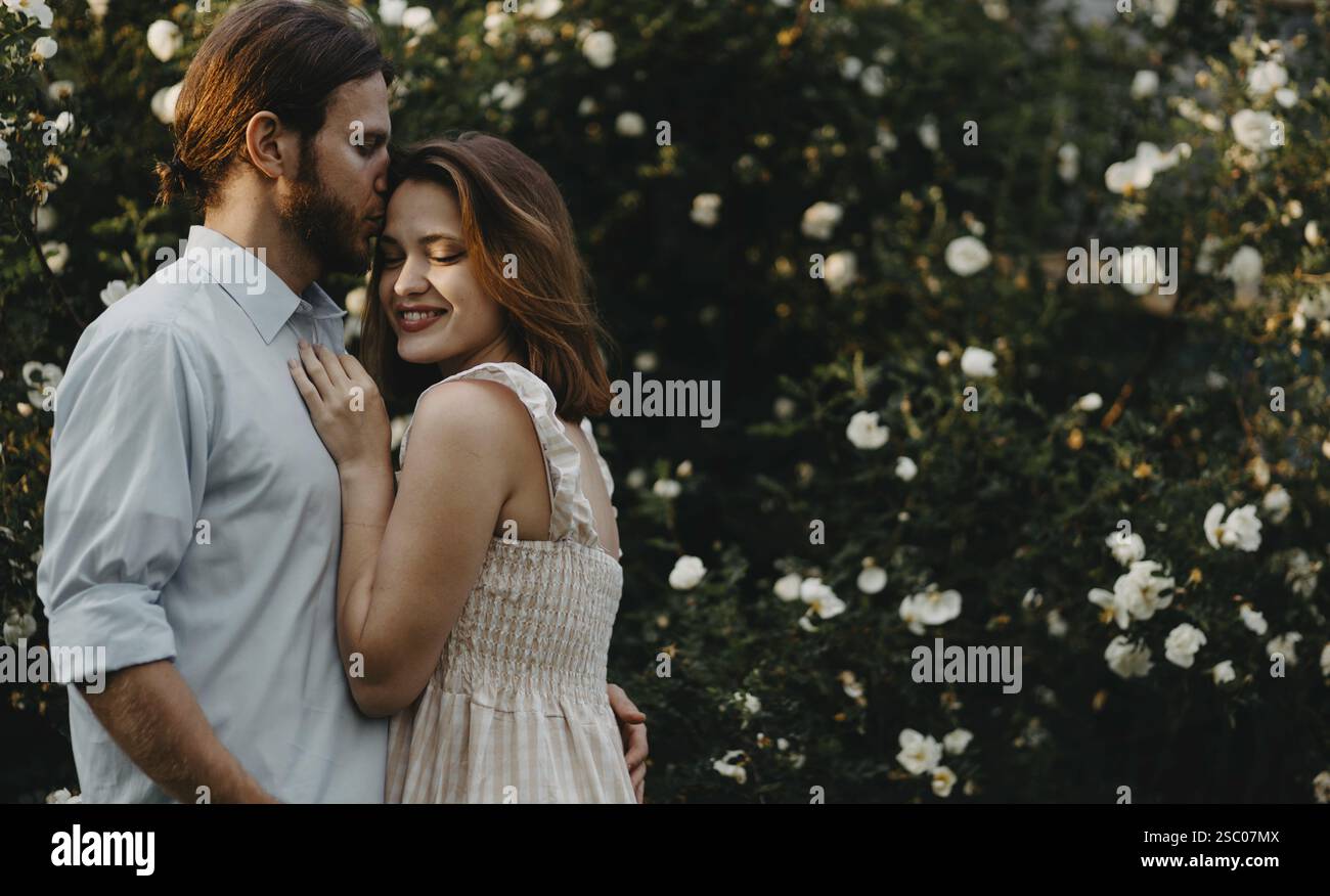 Young couple embraces sharing hi-res stock photography and images - Alamy