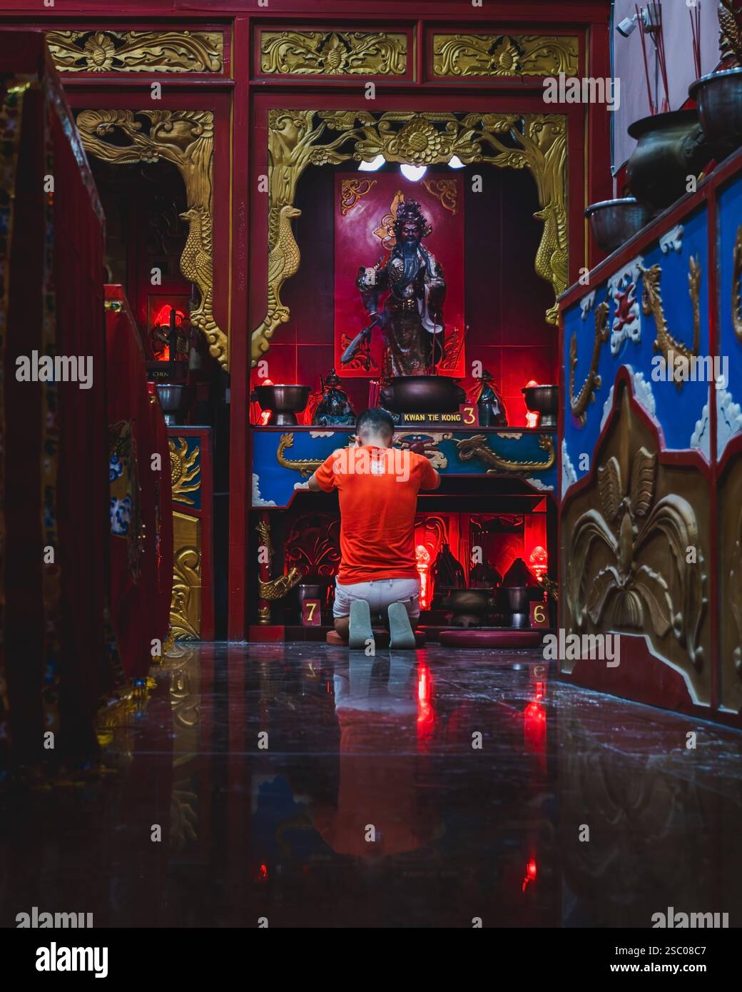 Balikpapan, Indonesia - January 28th, 2025. The man is kneeling in ...