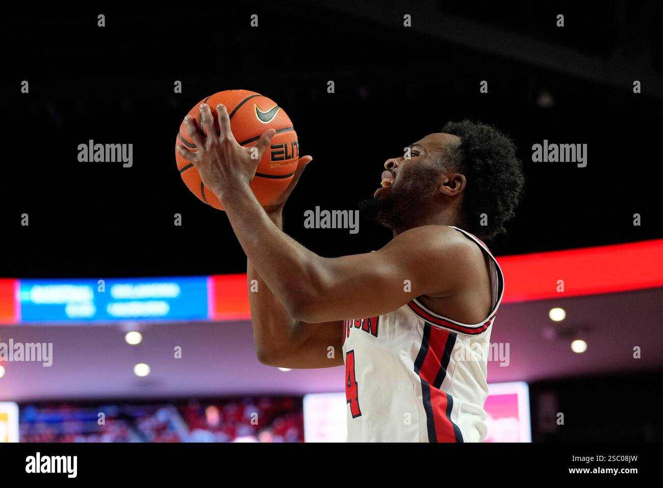 Houston guard L.J. Cryer (4) shoots during the first half of an NCAA ...