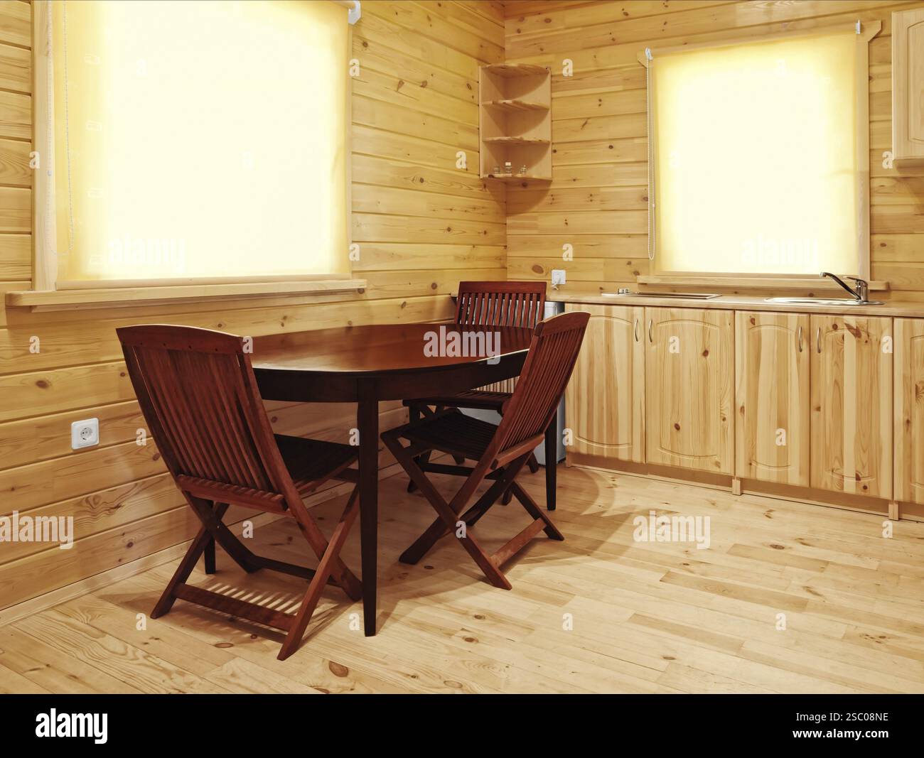 Interior of the kitchen in a wooden blockhouse Stock Photo - Alamy