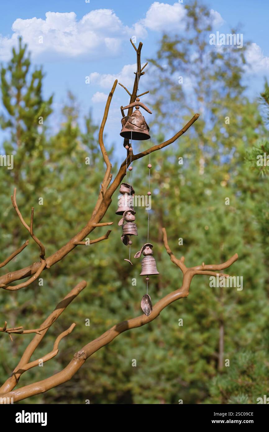 Ð¡lay bells hanging on the dry tree Naujene, Latvia, Europe Stock Photo ...