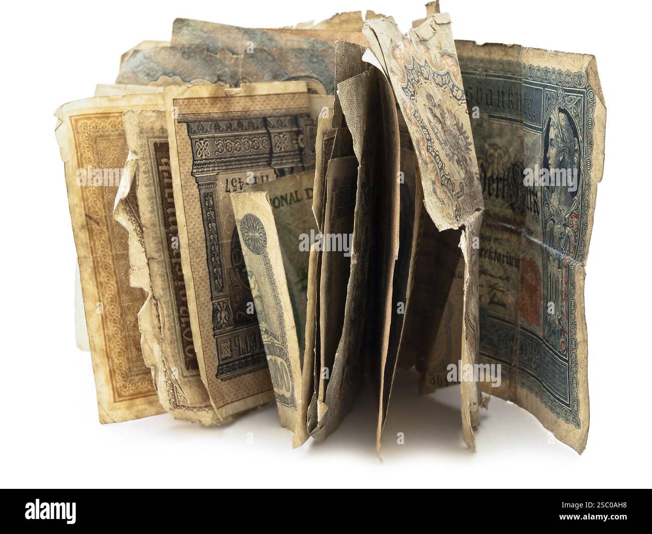 Different old paper currency over the white background Stock Photo - Alamy