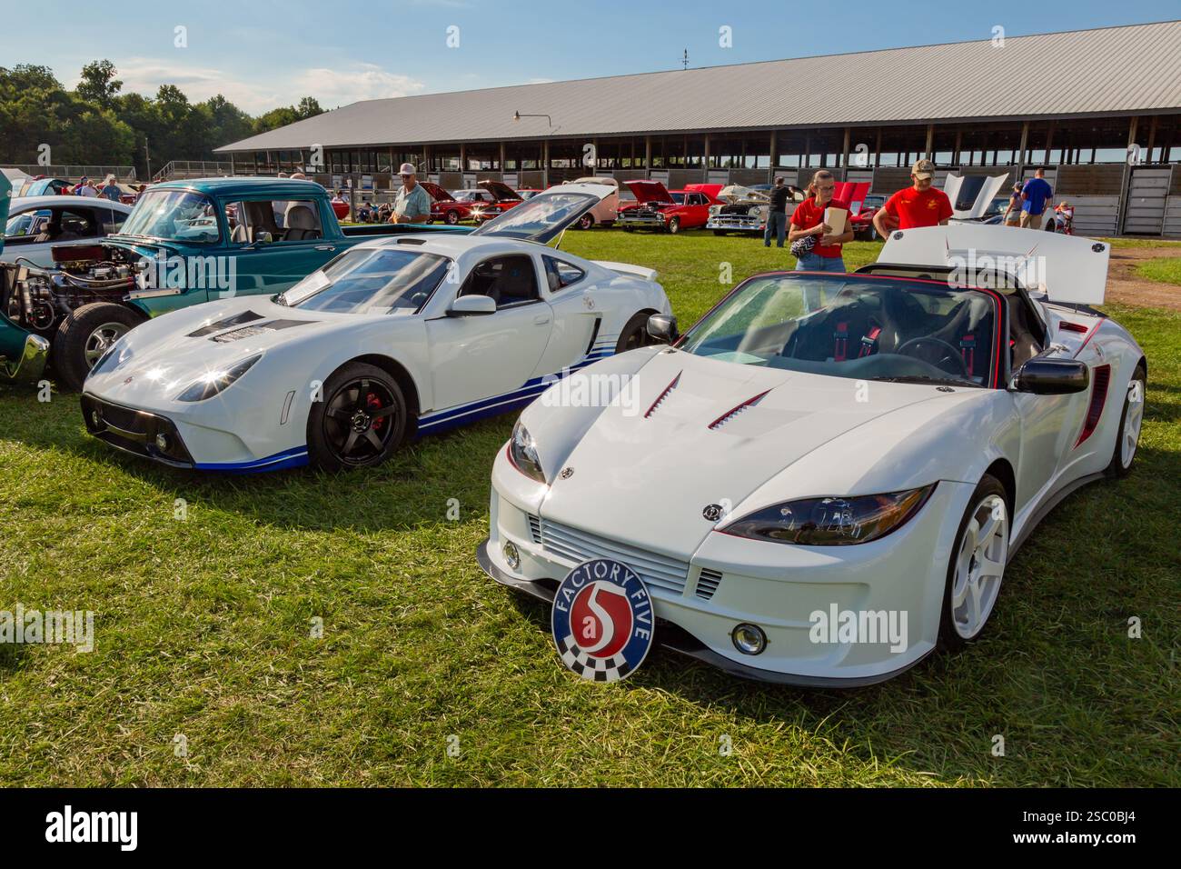 Two Factory 5 818 homebuilt sports cars on display in a car show at the ...