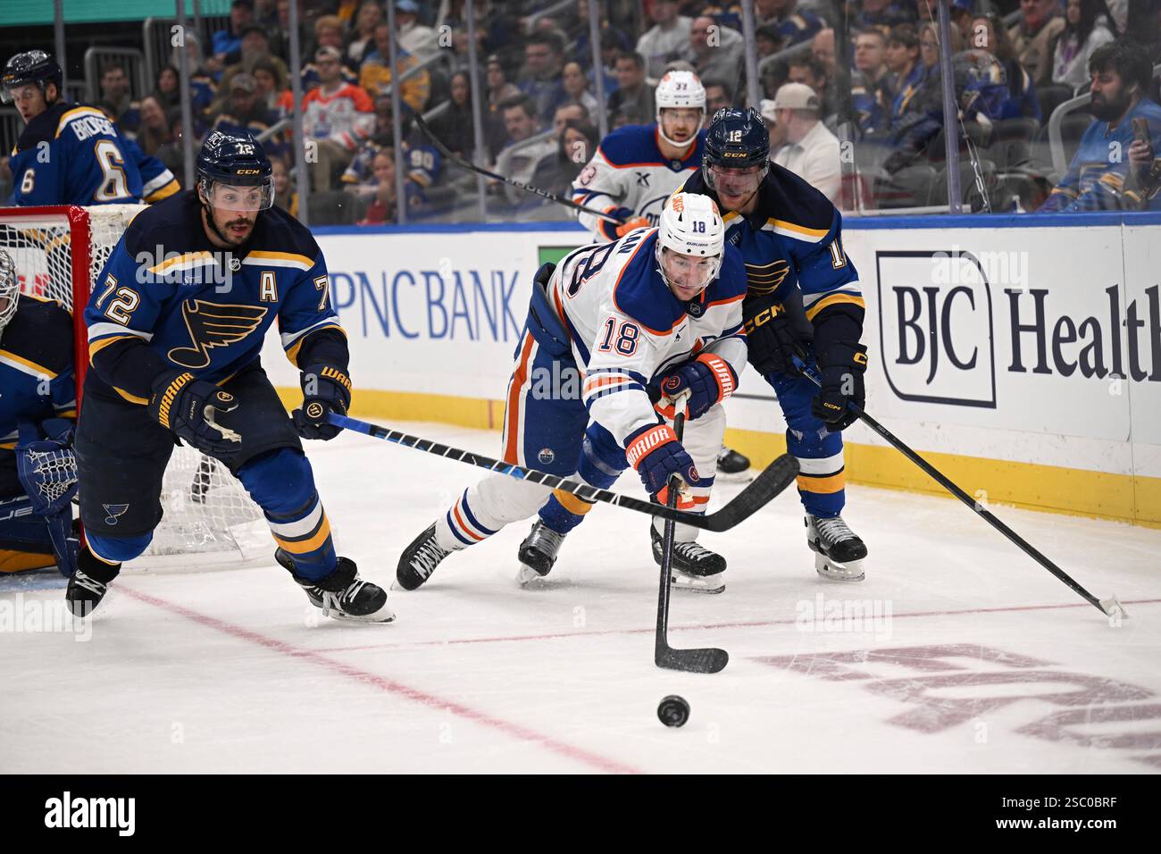 St. Louis Blues' Justin Faulk, left, Edmonton Oilers' Zach Hyman (18 ...