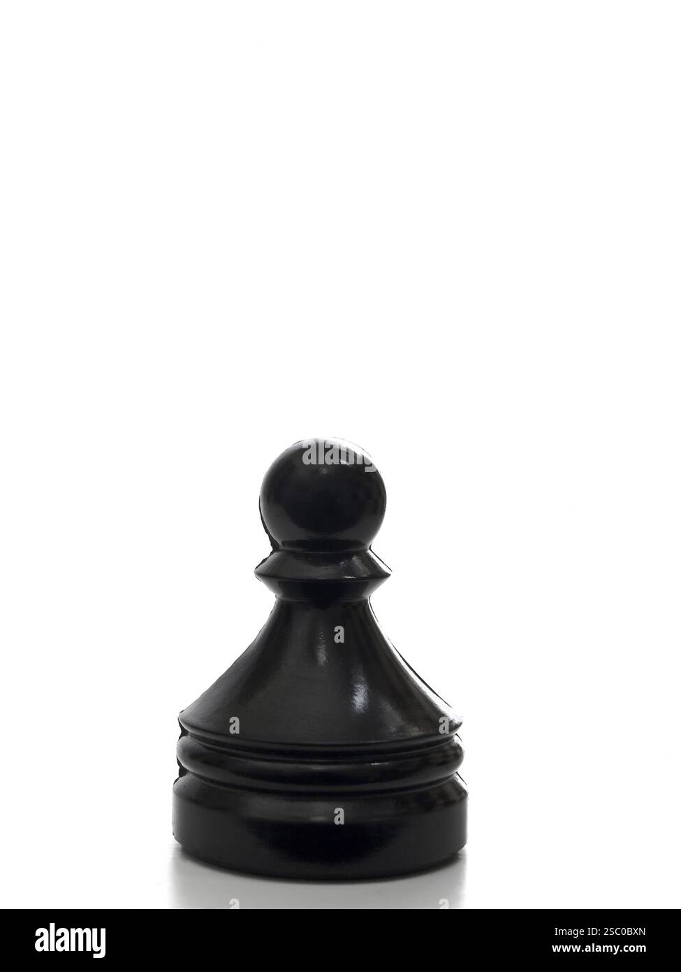 Single black pawn in chess against the white background Stock Photo - Alamy
