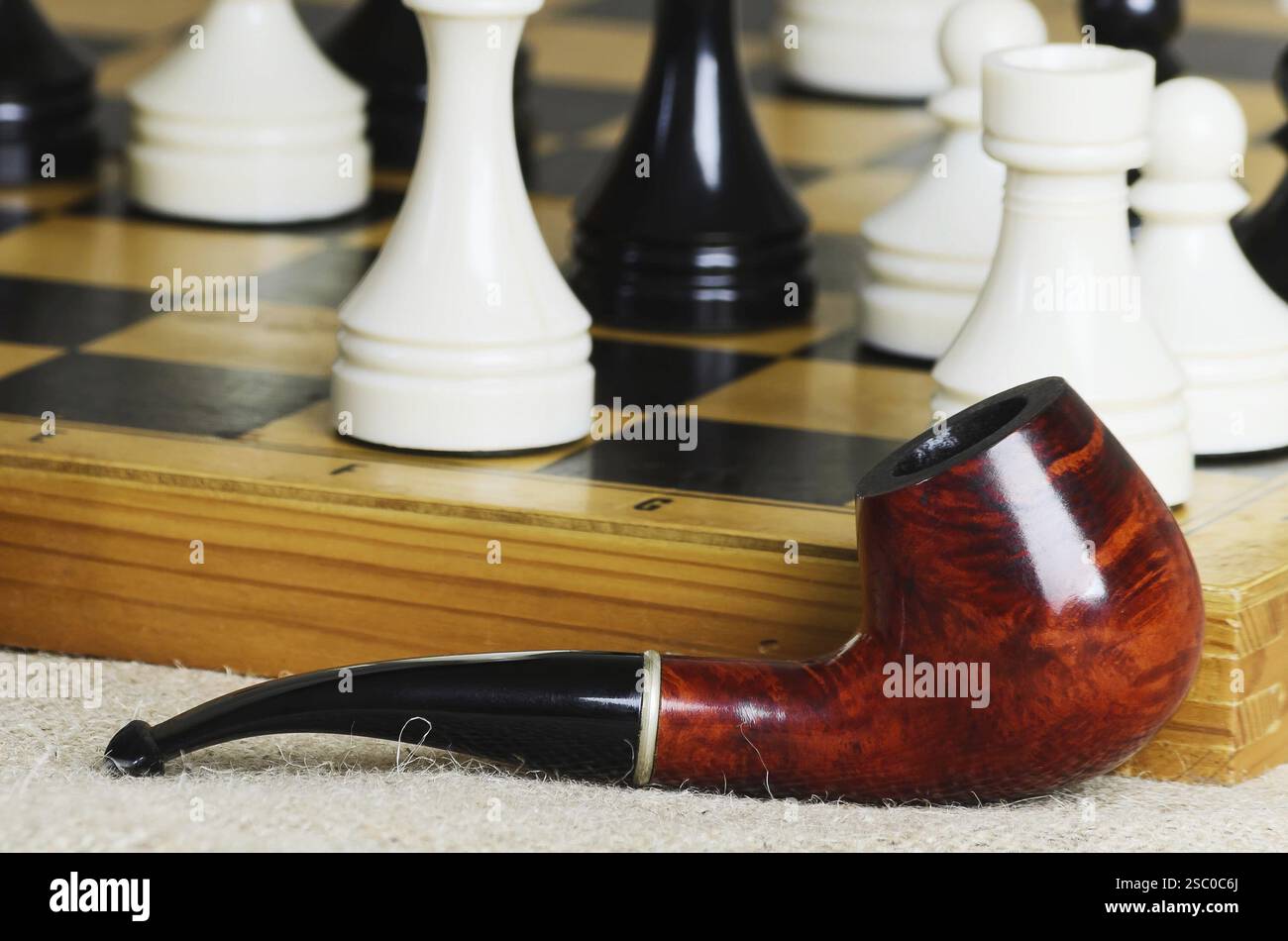 Chess middle game and tobacco pipe of one of the players Stock Photo ...