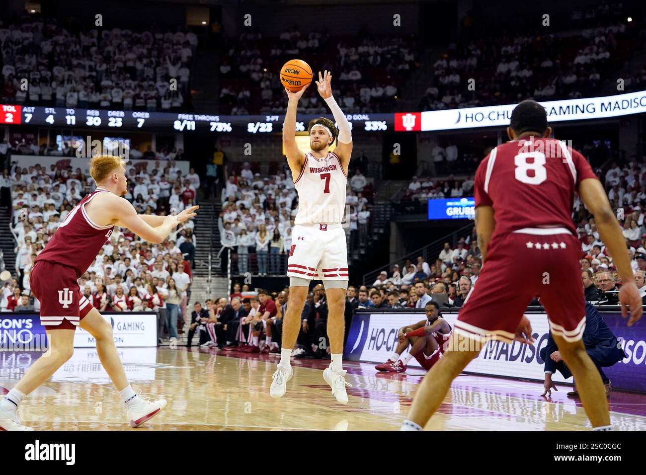 Wisconsin forward Carter Gilmore (7) scores a three-point basket ...
