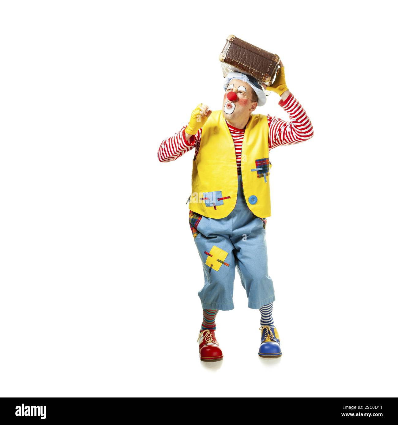 A funny clown with smiling joyful expression, isolated on white ...