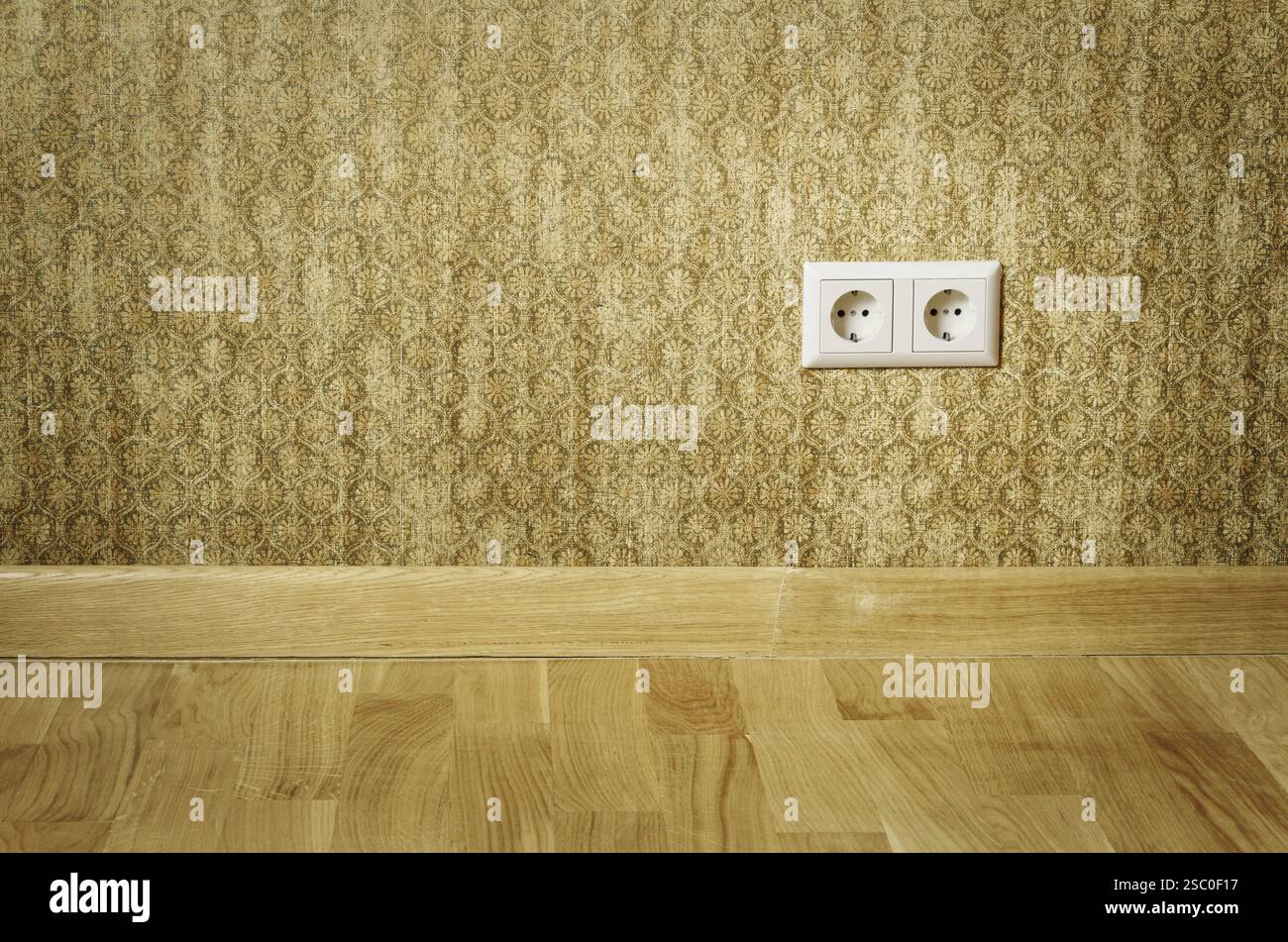 Double Socket In The Wall Of An Empty Room Stock Photo - Alamy
