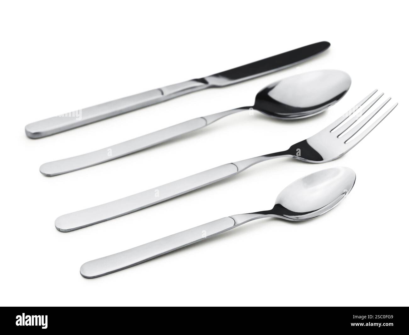 Set of silverware over the white background Stock Photo - Alamy
