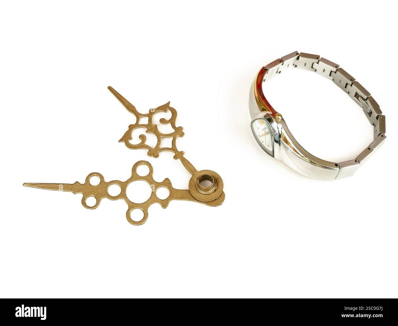 Photo of the golden clock hands against white background Stock Photo ...