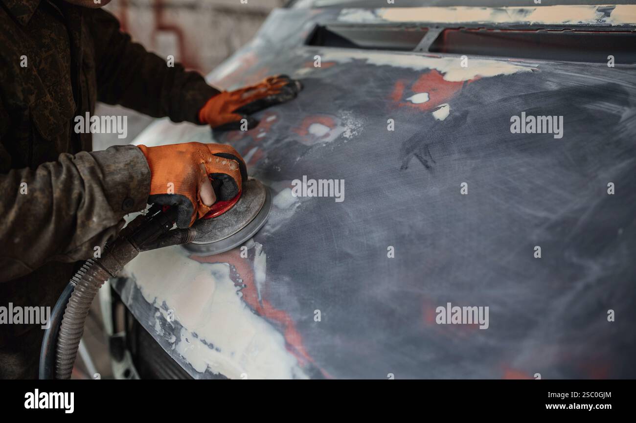Sanding the repaired part hi-res stock photography and images - Alamy
