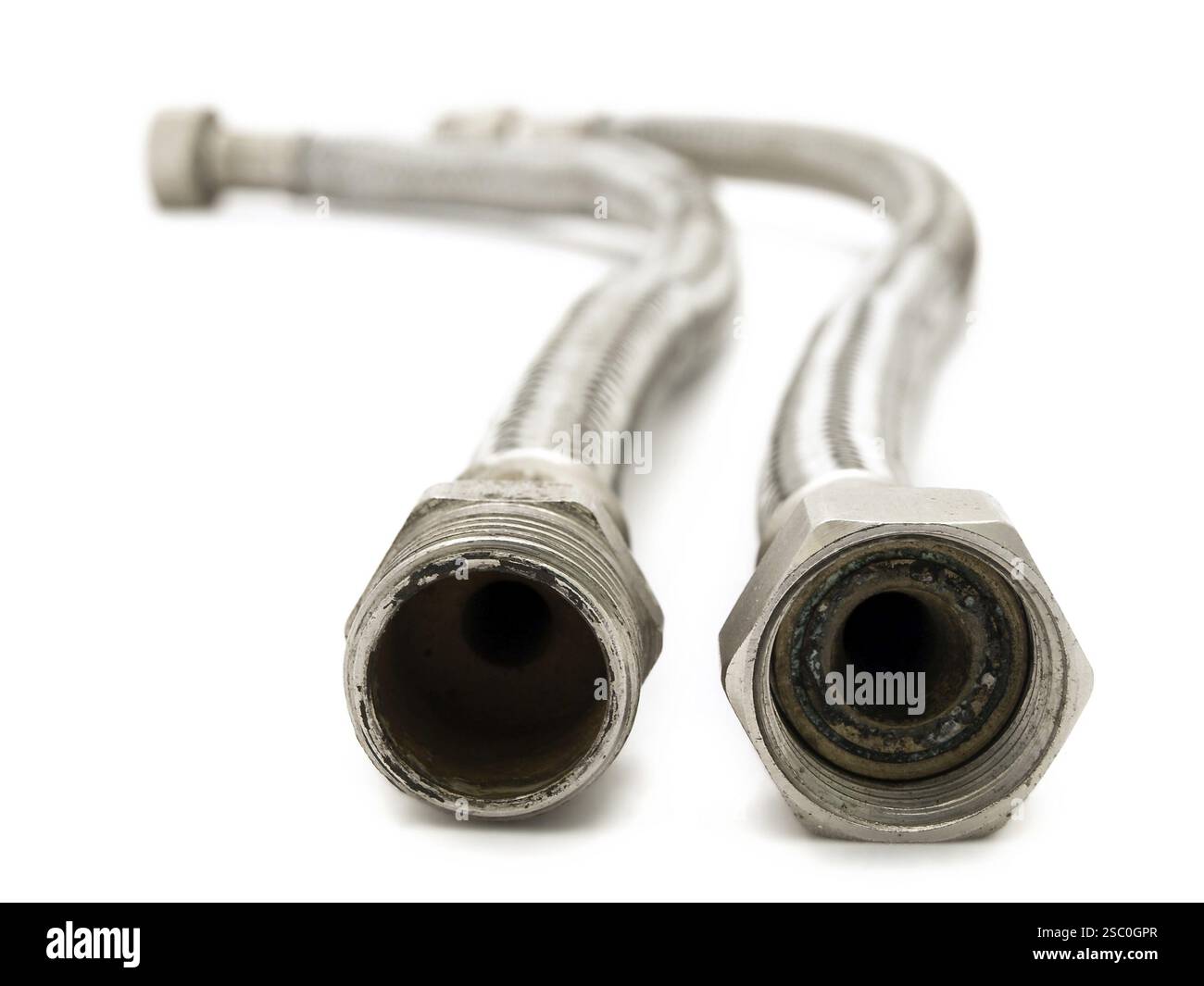 Photo of the metal hose against the white background Stock Photo - Alamy