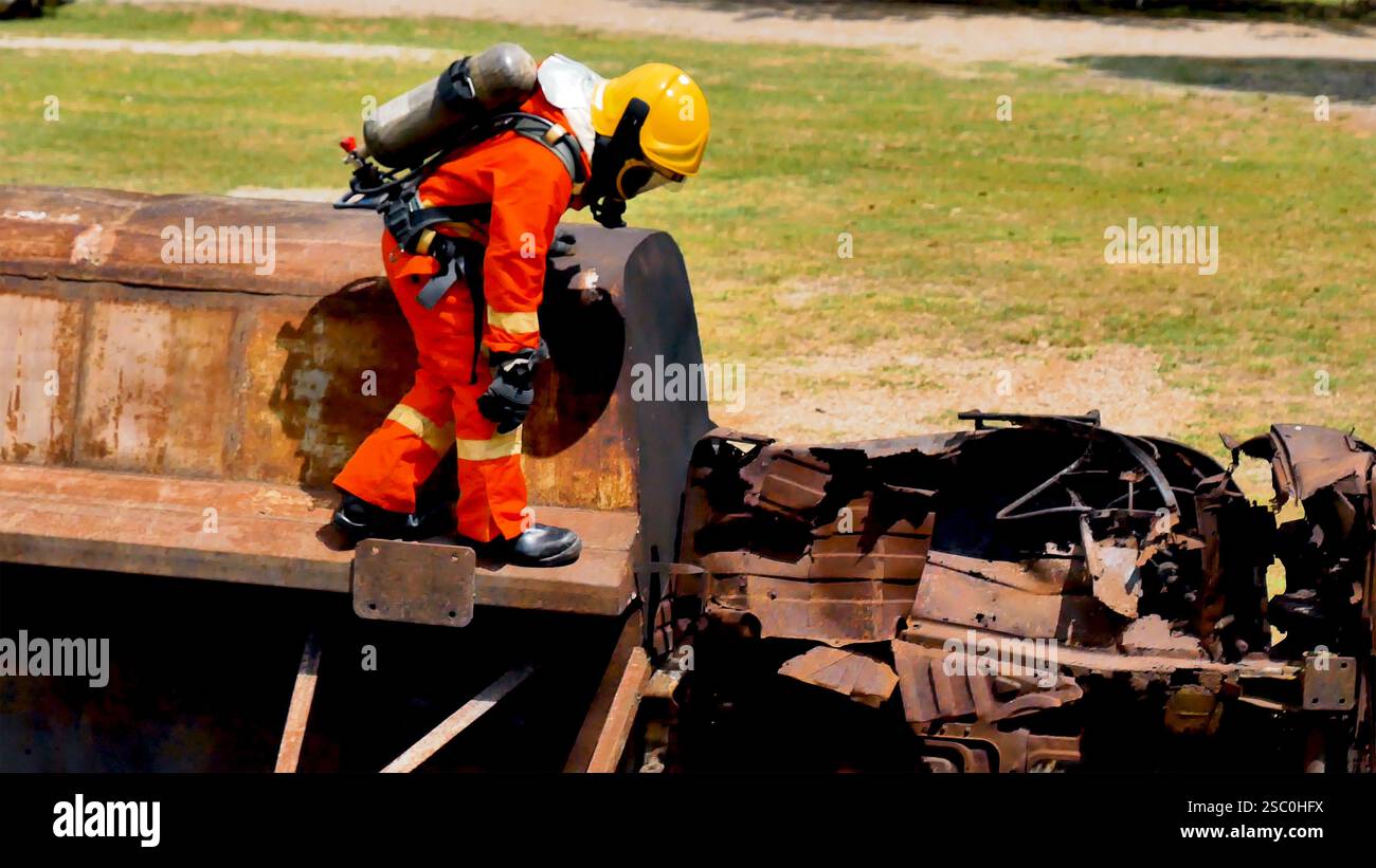 Firefighter fighting with flame using fire hose chemical water foam ...