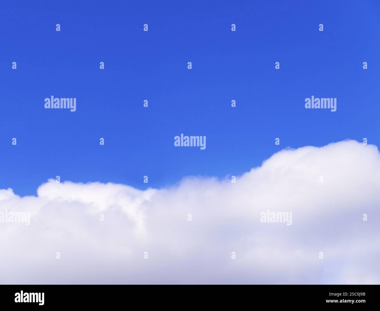 Clear Blue Sky Over The Single Cloud Stock Photo - Alamy