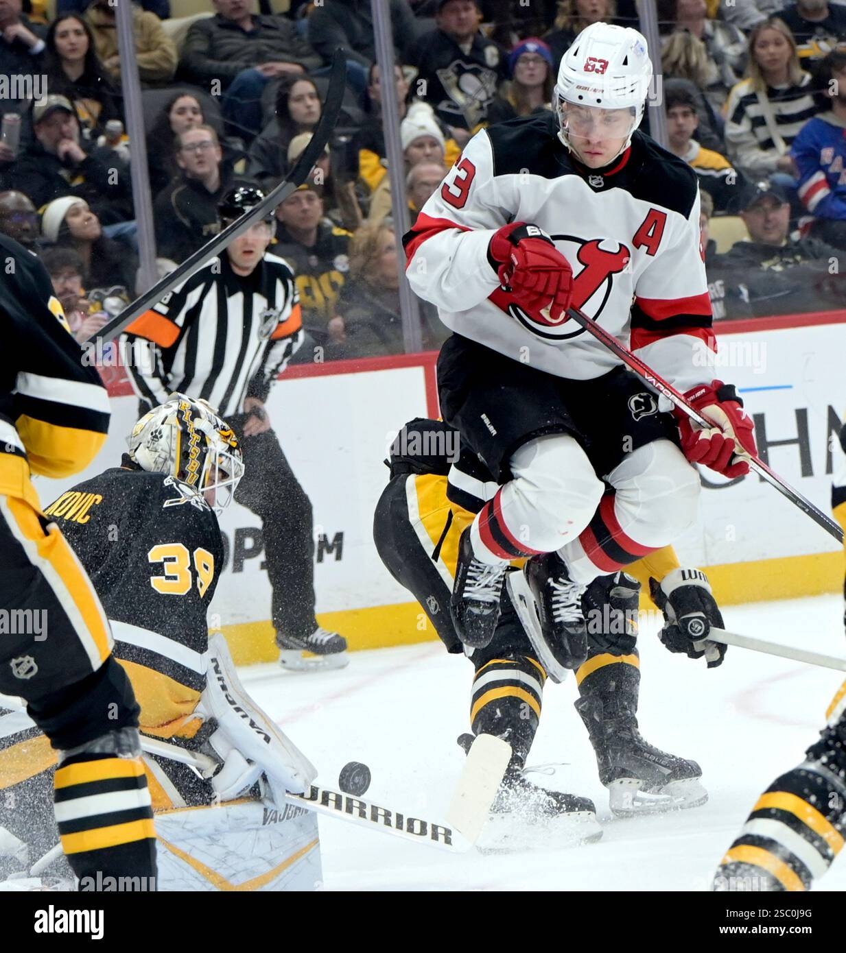 Pittsburgh Penguins goaltender Alex Nedeljkovic (39) makes the stop as ...