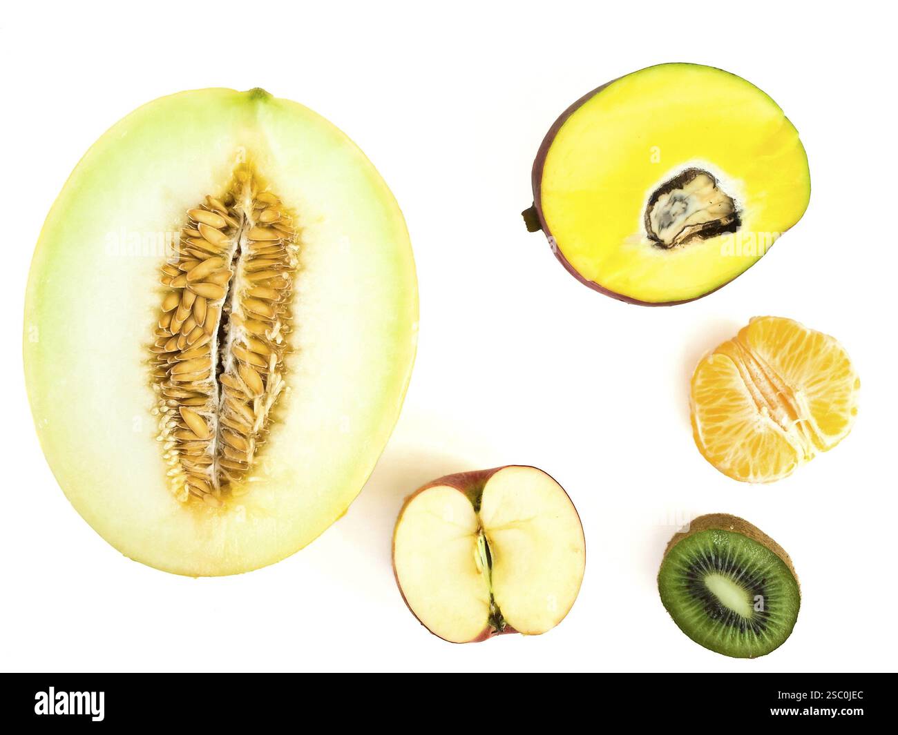 Half of different fruits against white background Stock Photo - Alamy