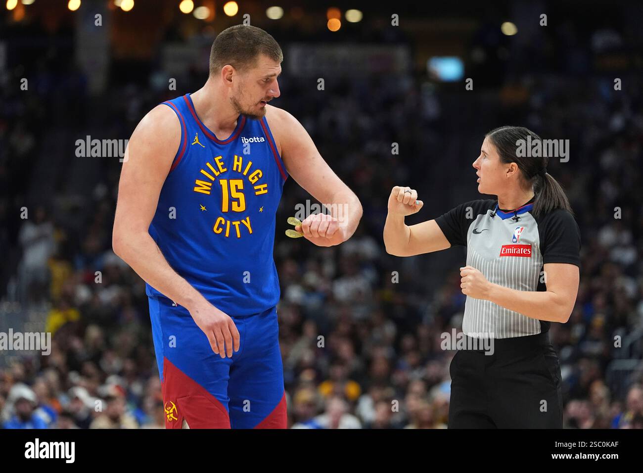 Denver Nuggets center Nikola Jokic (15) argues for a call with referee ...