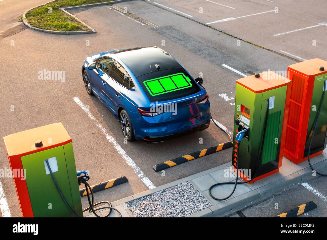 Electric auto with power indicator on rear windshield glass at public ...