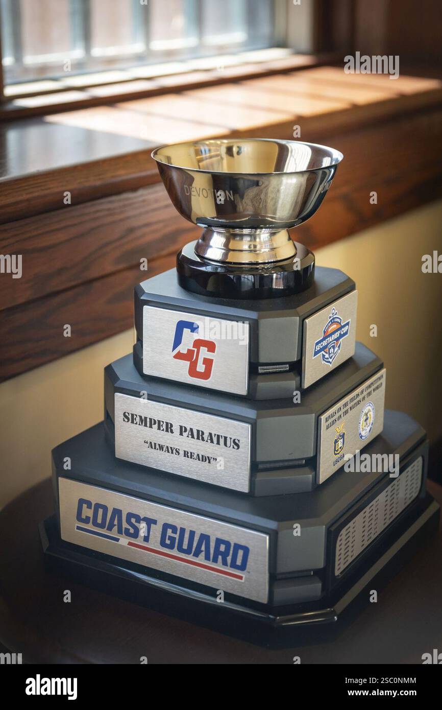 Homeland Security Secretary Alejandro Mayorkas is presented with the ...