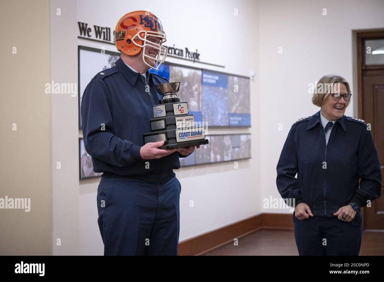 Homeland Security Secretary Alejandro Mayorkas is presented with the ...