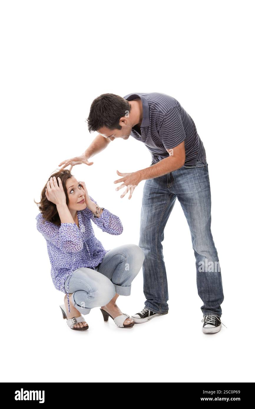 Angry couple yelling at each other isolated over white Stock Photo - Alamy